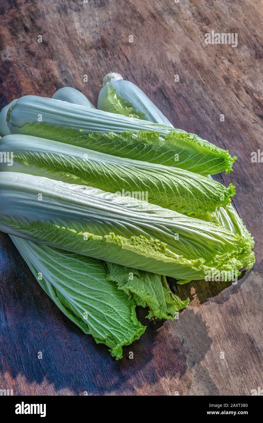Napa or Chinese cabbage on wooden background, Dalat, Vietnam Stock ...