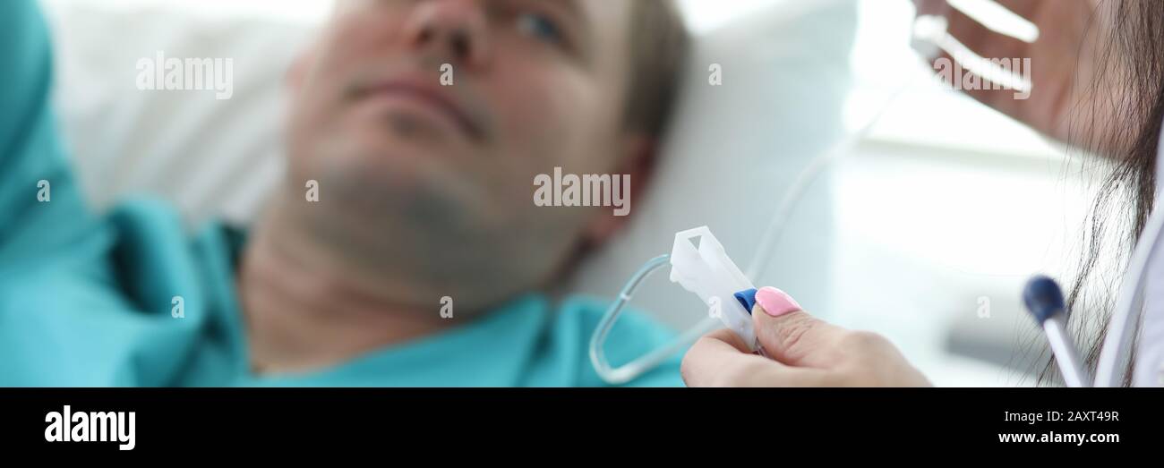 Ill patient treating in hospital Stock Photo - Alamy