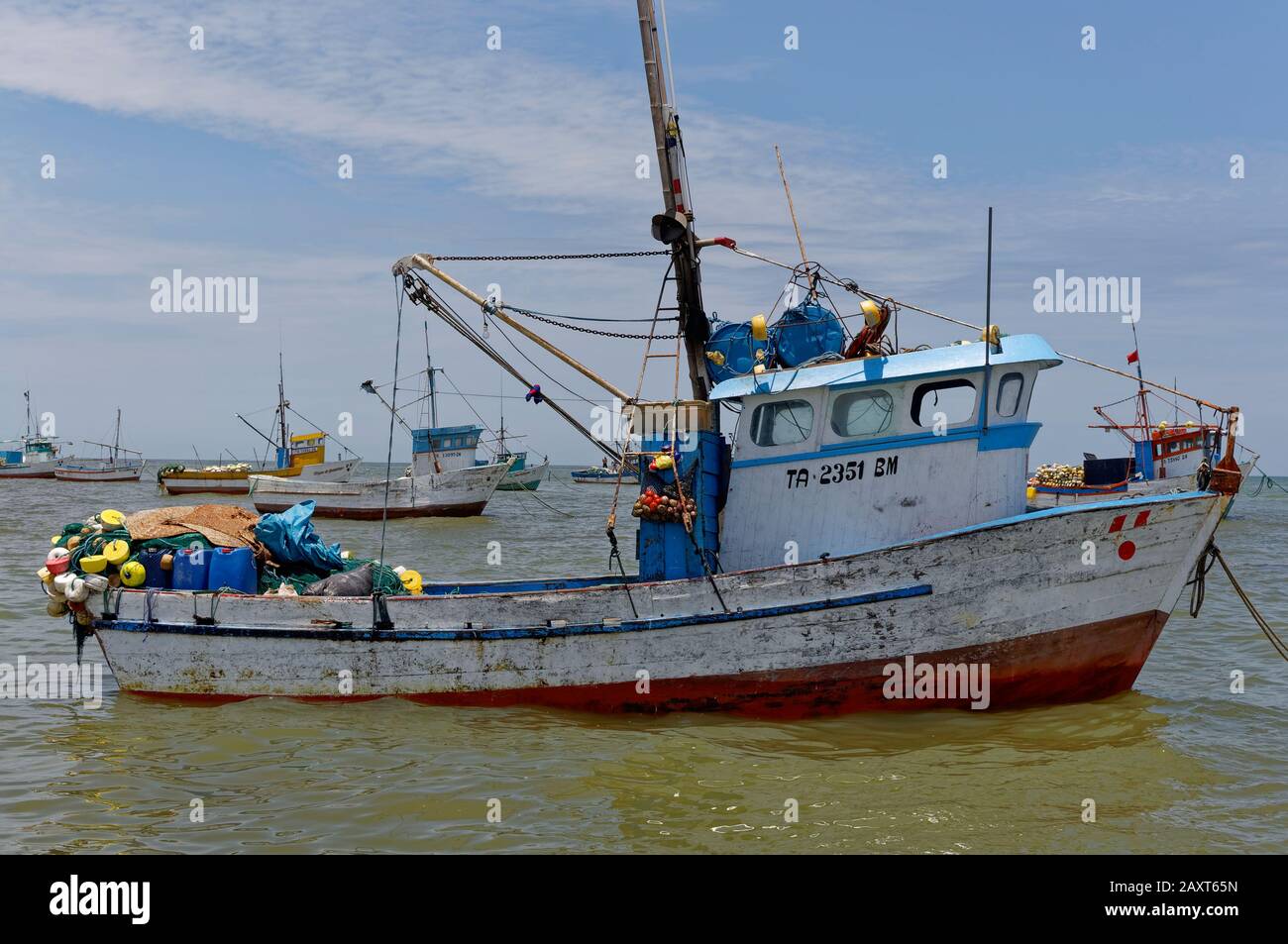 A traditional Peruvian Wooden Inshore Fishing Boat anchored off the ...
