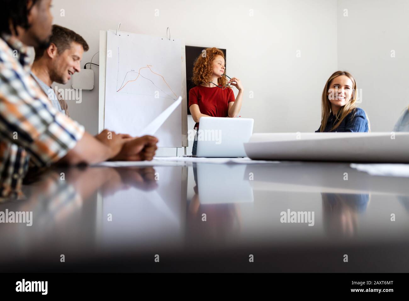 Successful group of designers, business people at work in office Stock Photo - Alamy