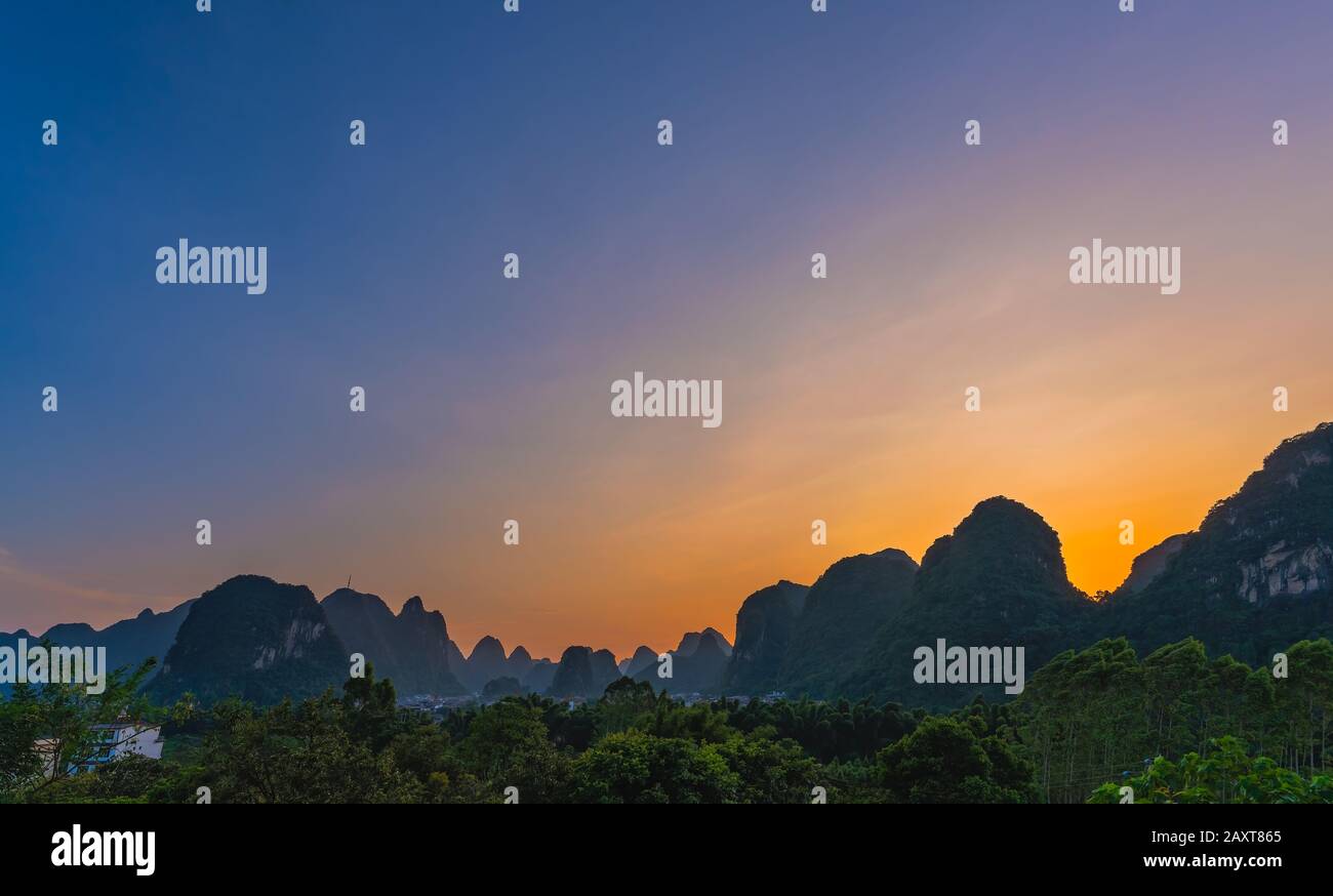 Beautiful impressive karst mountain landscape in Yangshuo at dusk ...