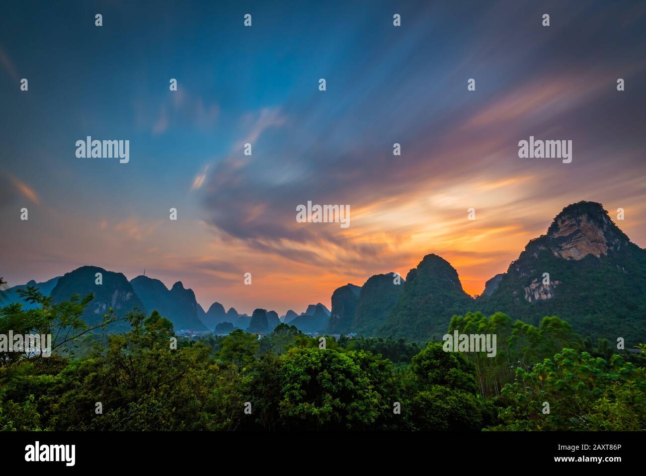 Beautiful impressive karst mountain landscape in Yangshuo at dusk ...