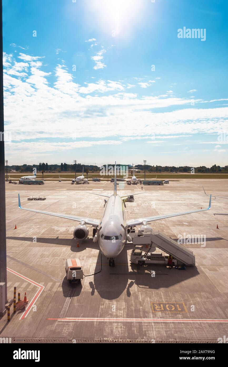 Airplane, view from airport terminal Stock Photo - Alamy