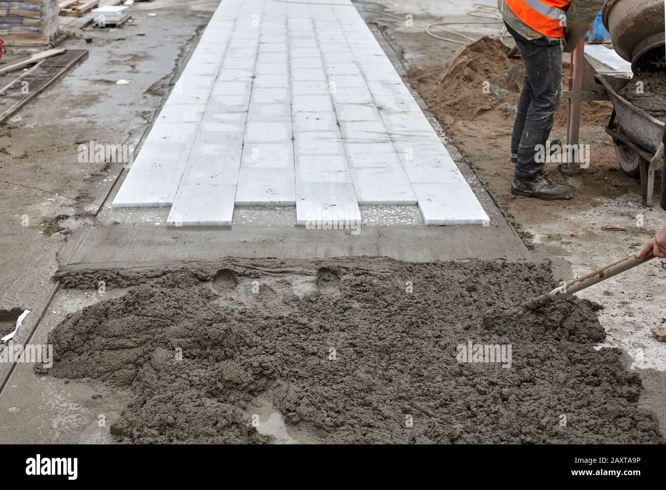 workers makes a new pavement Stock Photo - Alamy