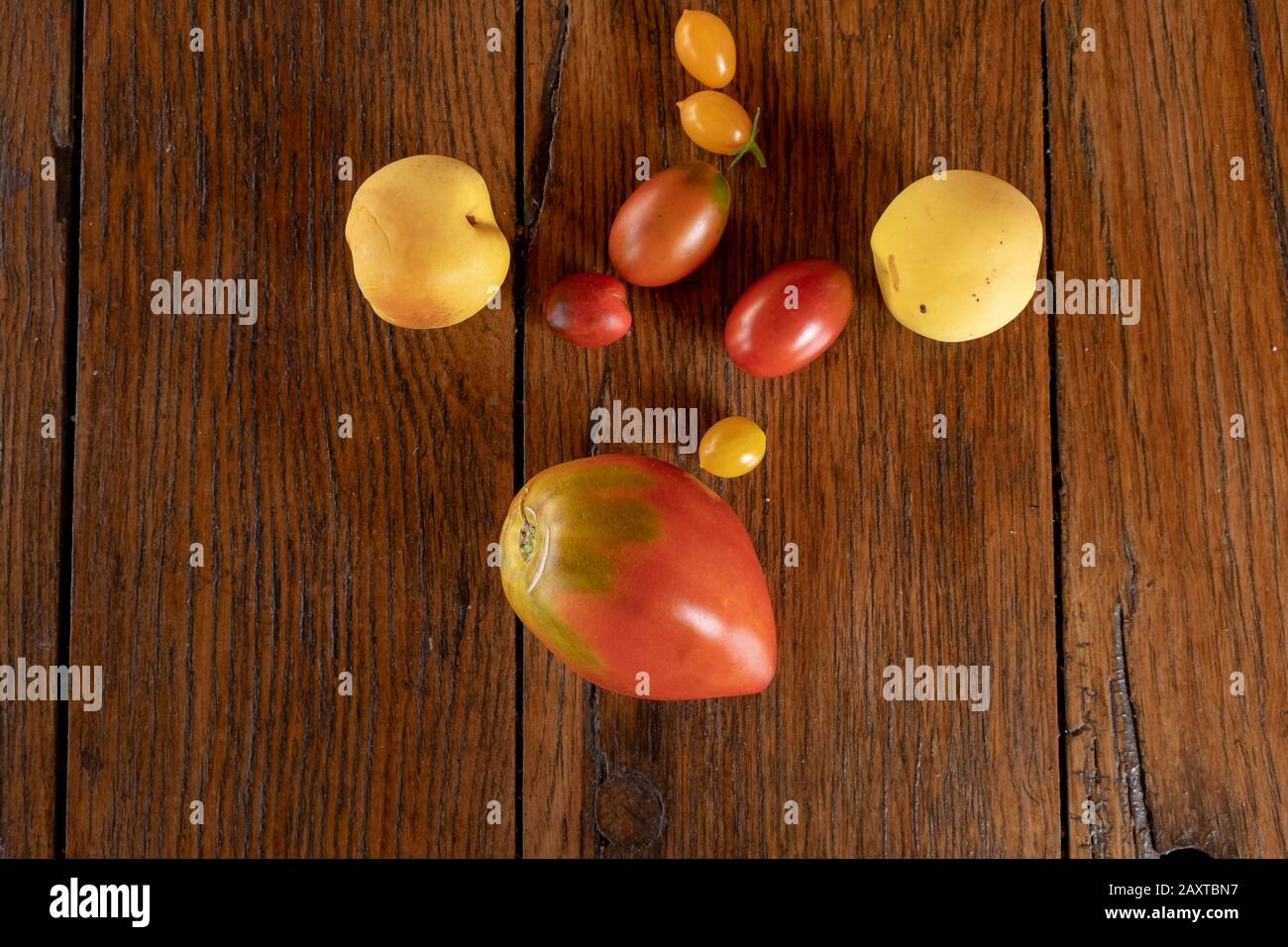 Healthy food based on tomato, cherry anda apple,color red and yellow ...