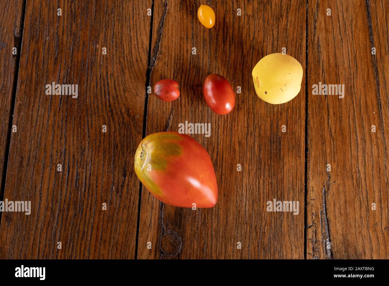 Healthy food based on tomato, cherry anda apple,color red and yellow ...