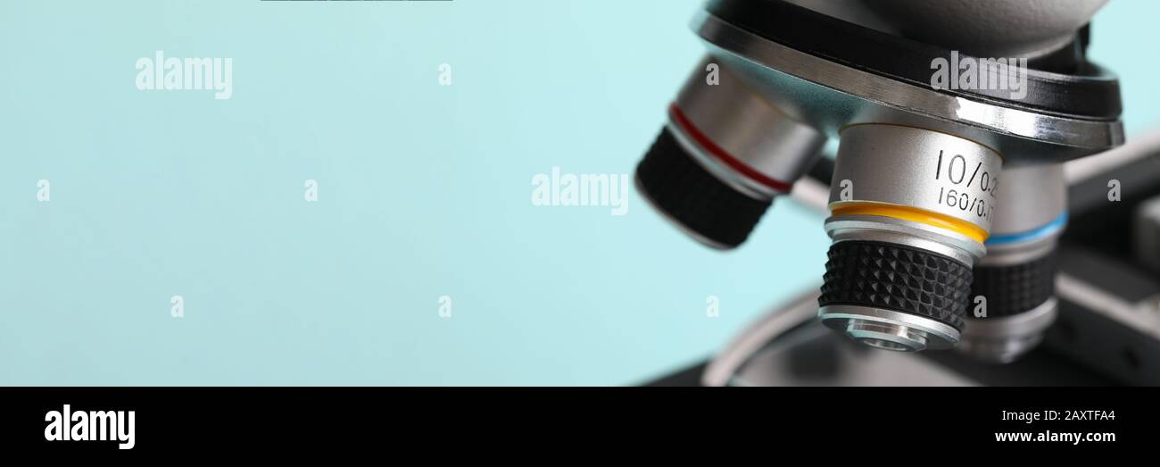 Chemistry microscope on modern blue background Stock Photo - Alamy