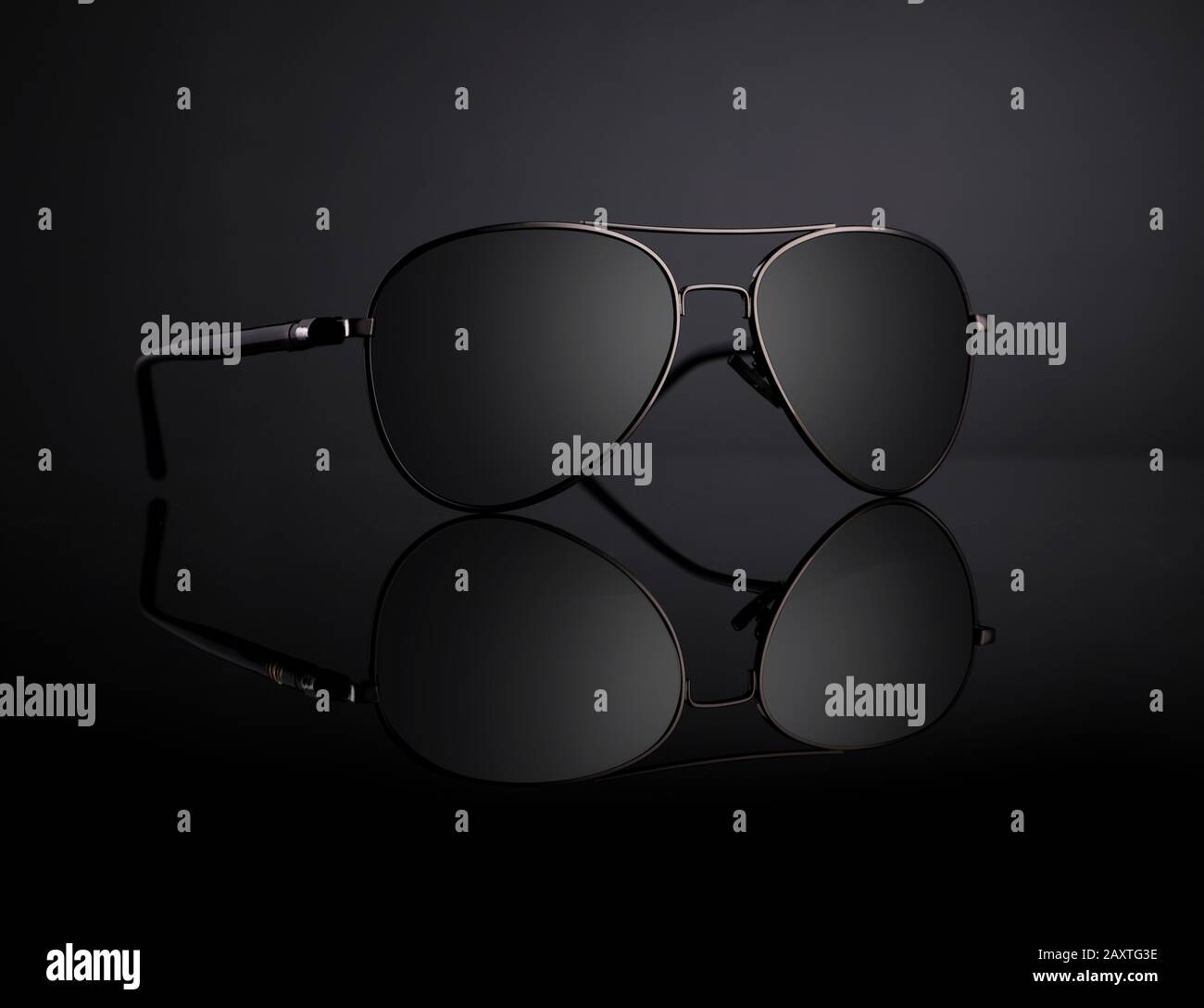 Black Aviator Sunglasses with Reflection on Black Background Stock ...