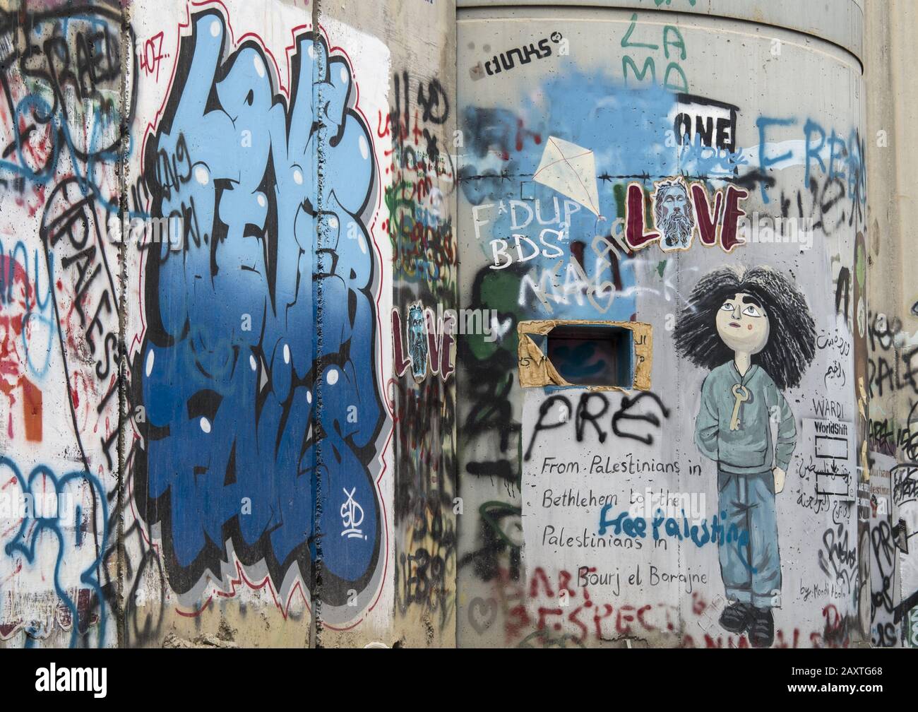 Jerusalem, Israel - 12/15/2019: graffiti on the wall between border of ...