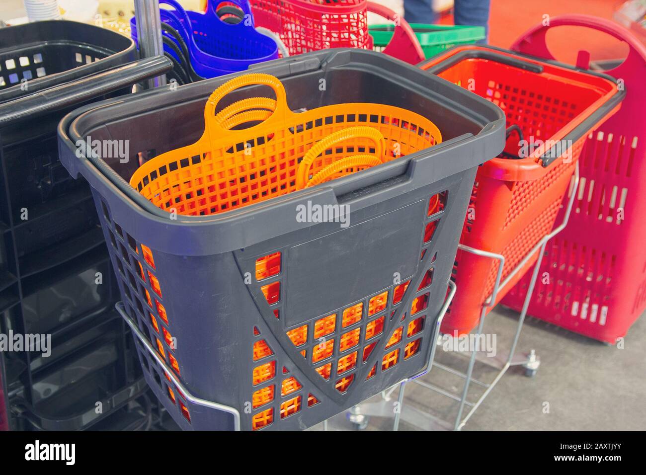Various empty shopping basket in a supermarket Stock Photo - Alamy