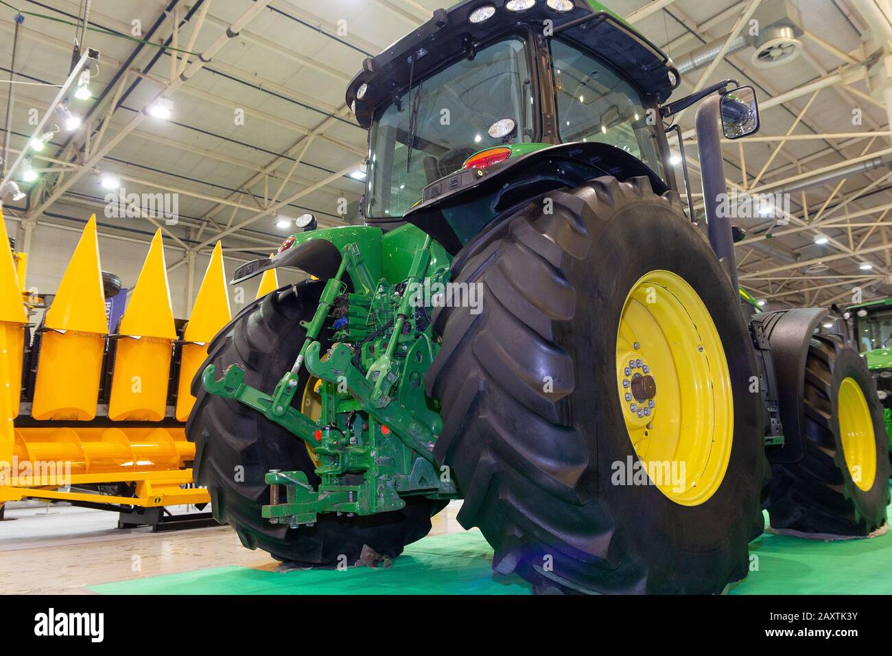 Farm tractor in the exhibition hall. Industry Stock Photo - Alamy