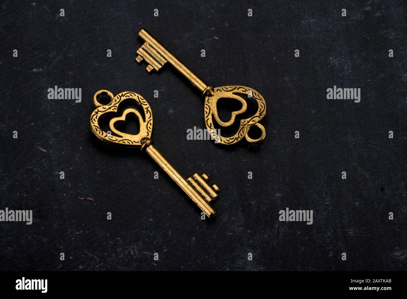 Unlock My Heart - Two Heart Shaped Golden Vintage Keys on Black ...