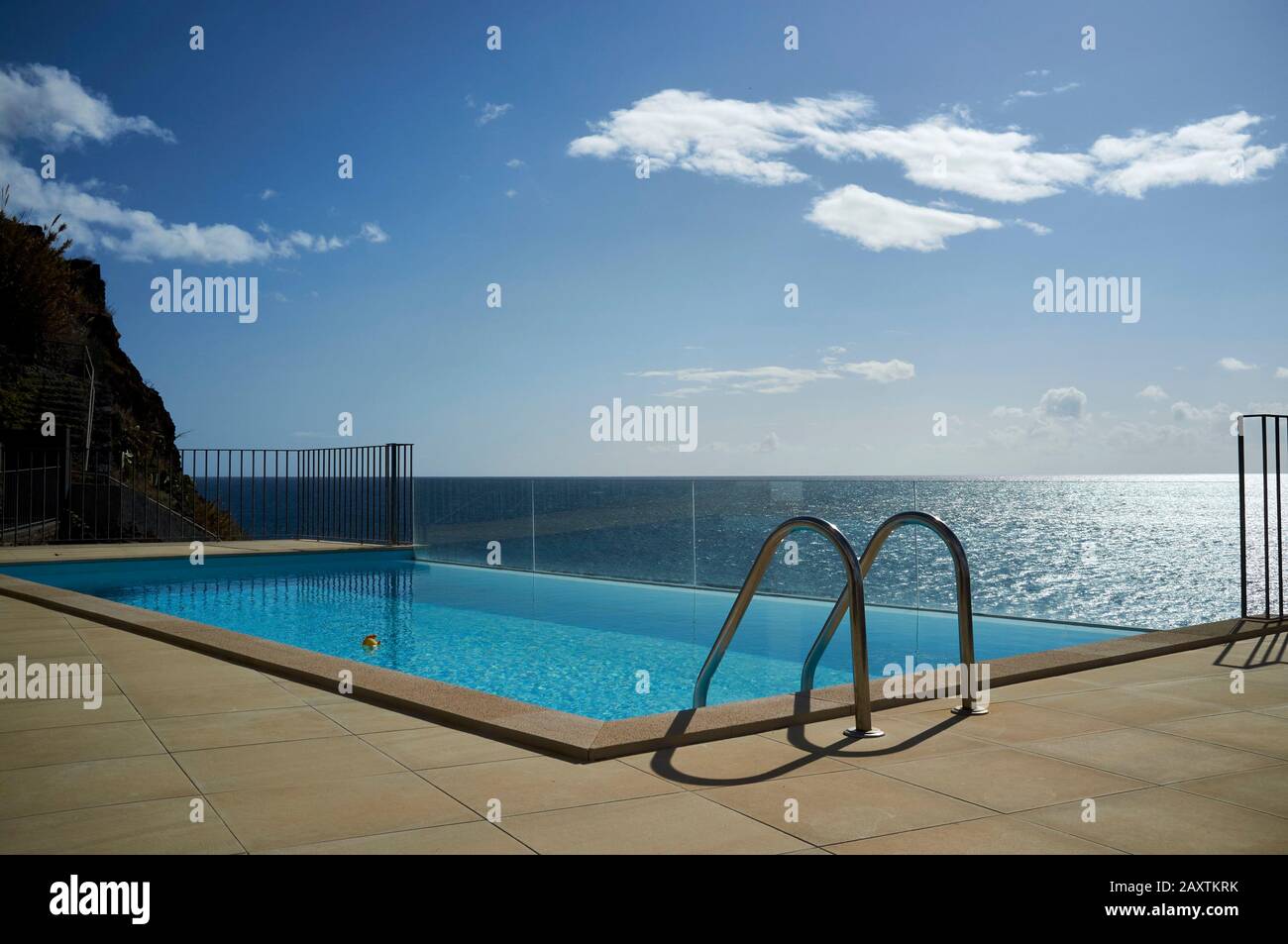 Infinity pool with sea behind western Madeira, Portugal, EU Stock Photo ...
