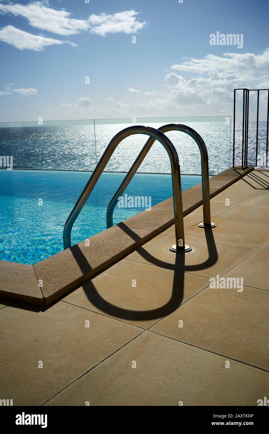 Infinity pool with sea behind western Madeira, Portugal, EU Stock Photo ...