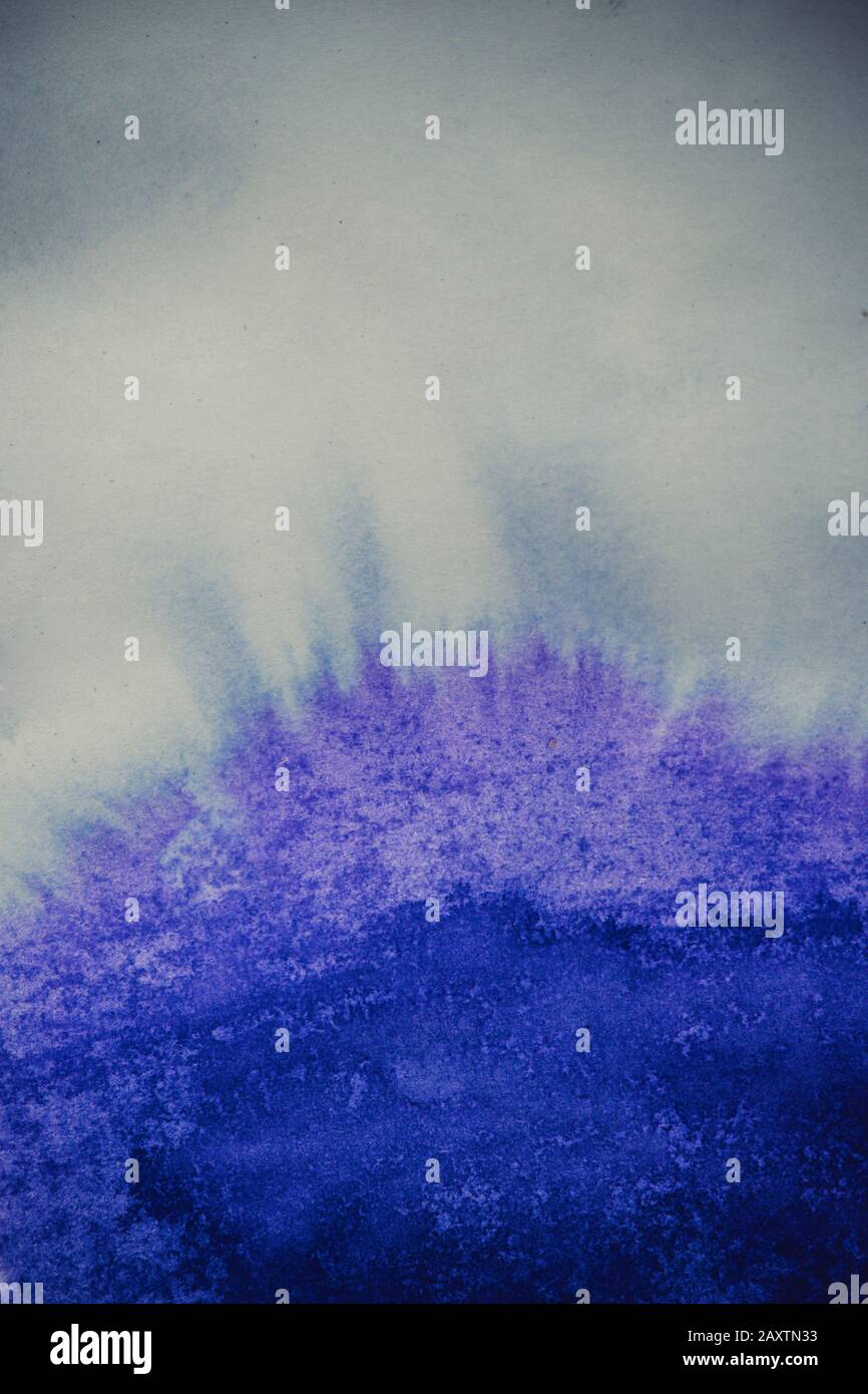 ink spot spreads on paper blue color Stock Photo - Alamy