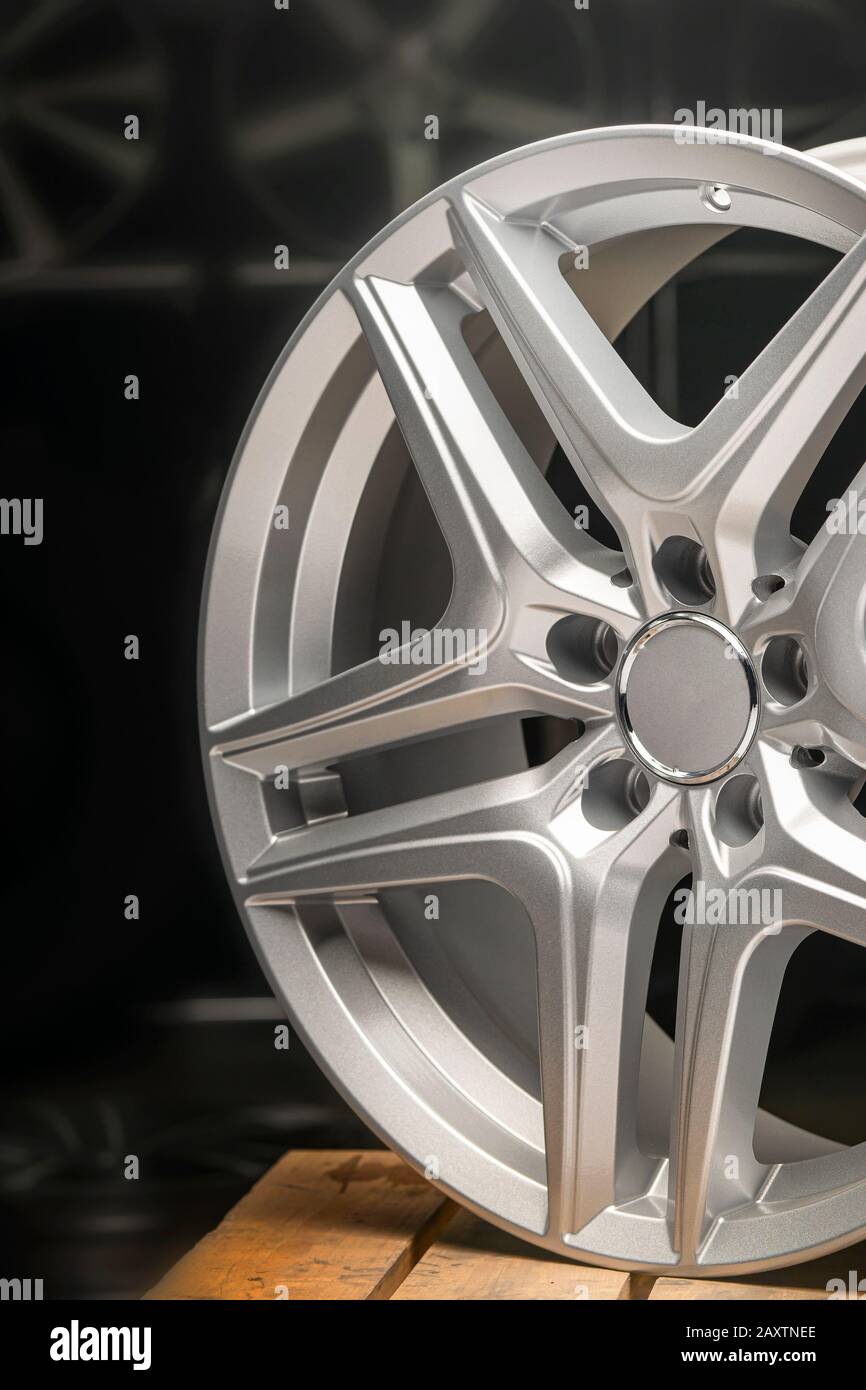 alloy wheel silver, rim new car wheel on a black background Stock Photo ...