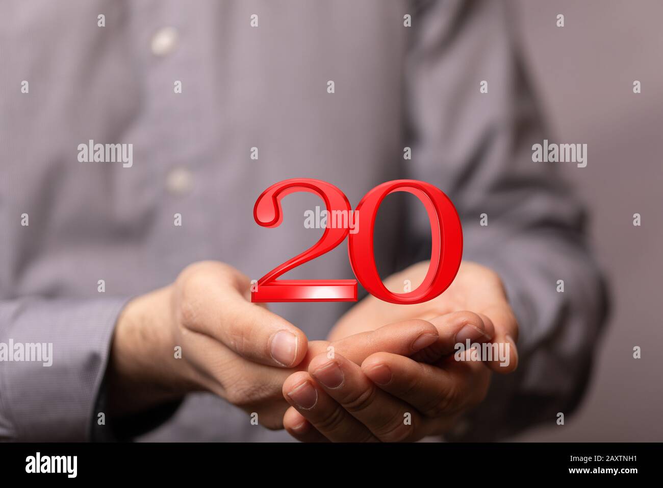 Illustration of the number 20 over someone's hands Stock Photo - Alamy