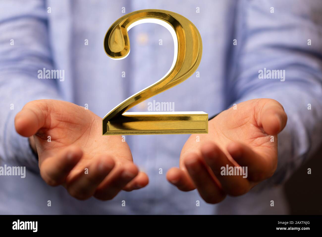 Illustration of the number 2 over someone's hands Stock Photo - Alamy