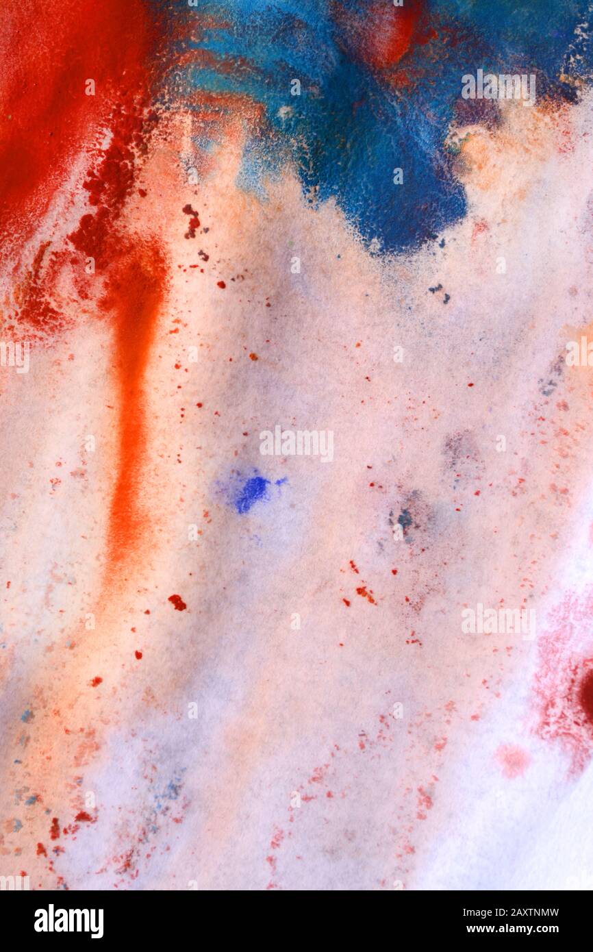 Mixing of paints of different colors on a white paper. Abstract ...