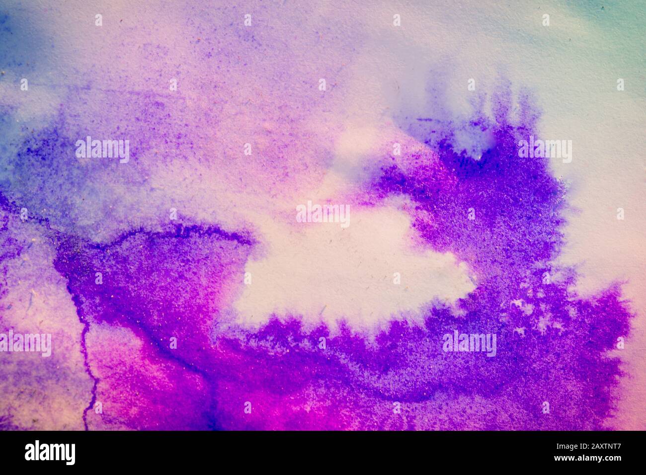 ink spot spreads on paper purple and pink color Stock Photo - Alamy