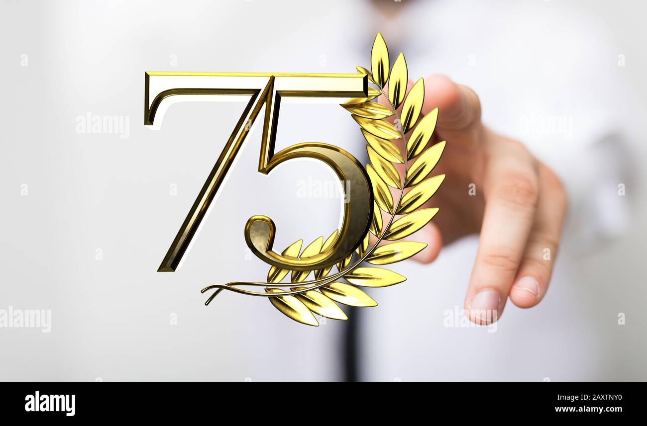 Number 75 and spikes of wheat over a person's fingers Stock Photo - Alamy