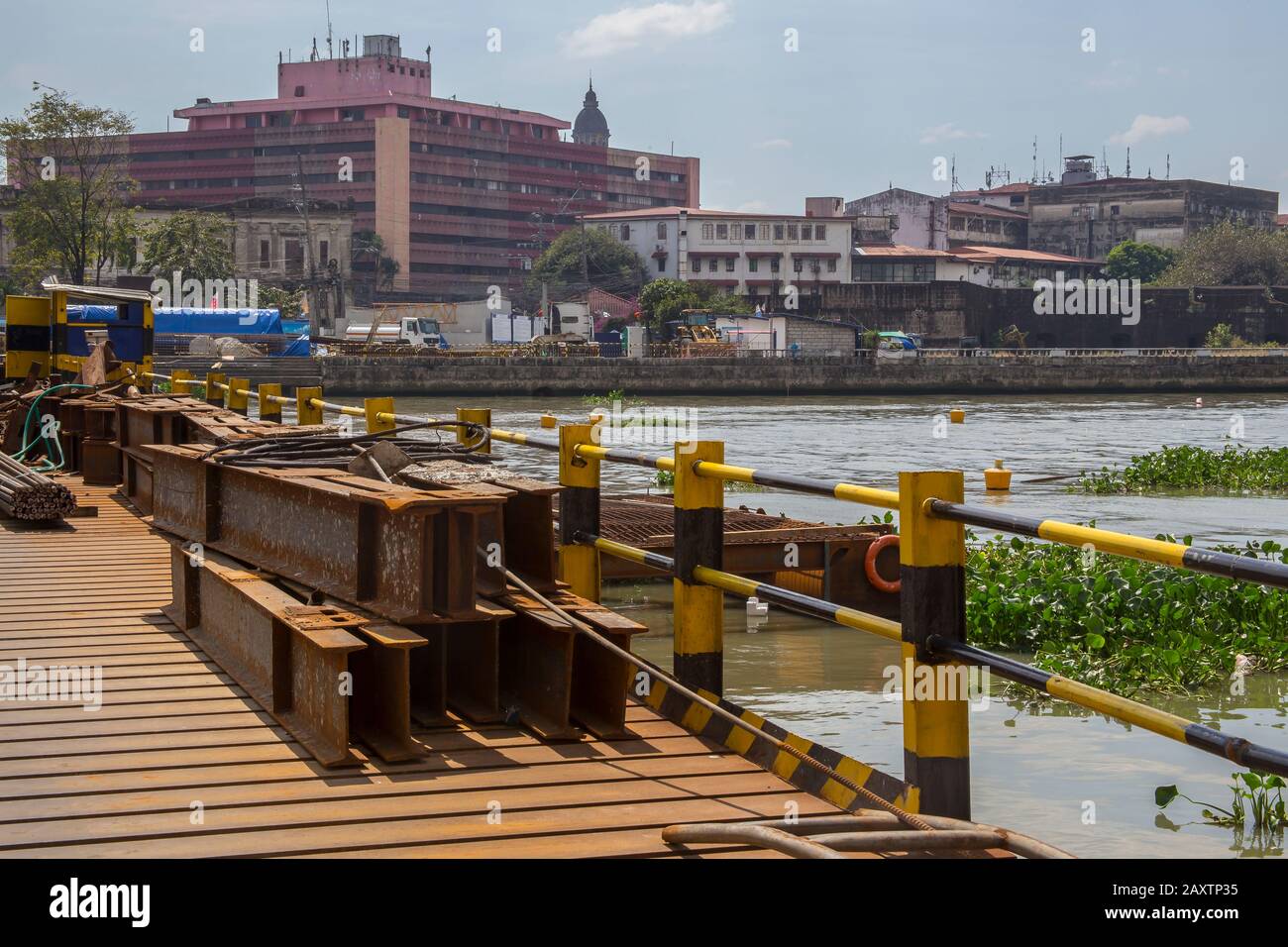 A bridge that cuts through the Pasig River is currently under ...