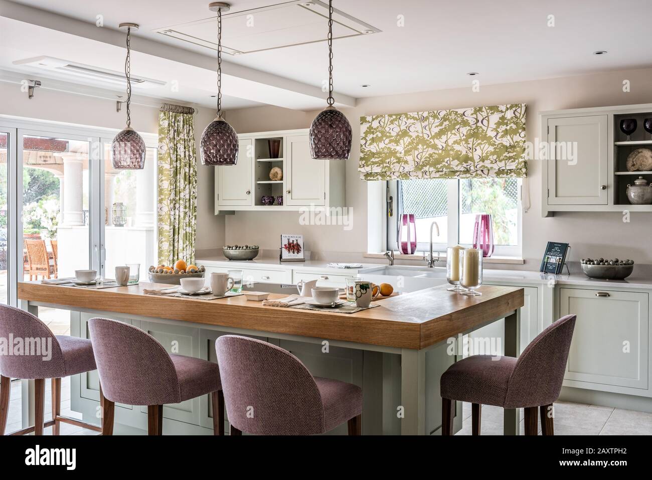 Place settings on kitchen counter Stock Photo - Alamy