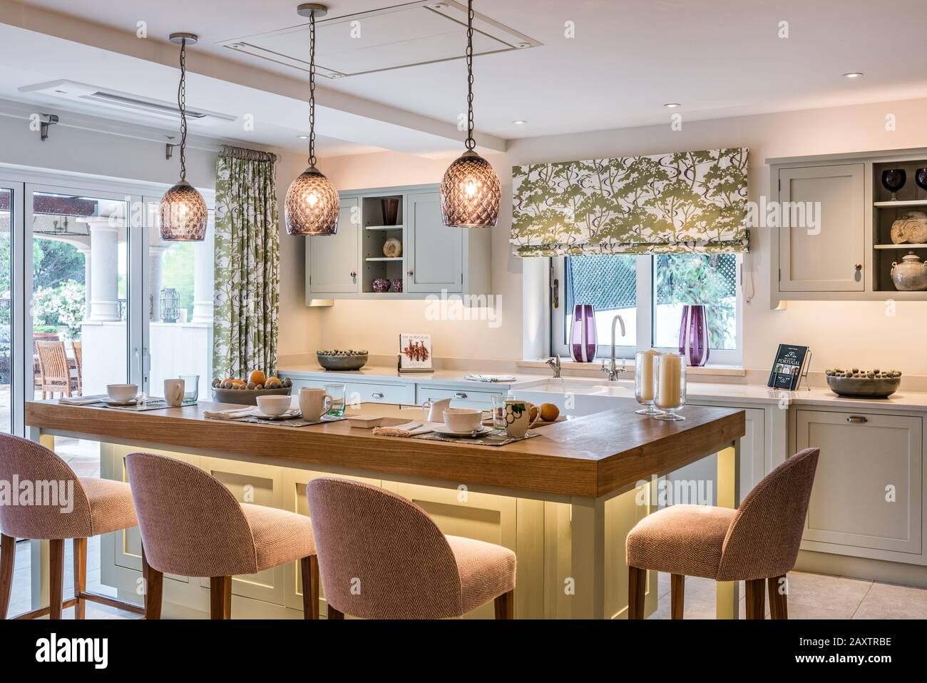 Place settings on kitchen counter Stock Photo - Alamy