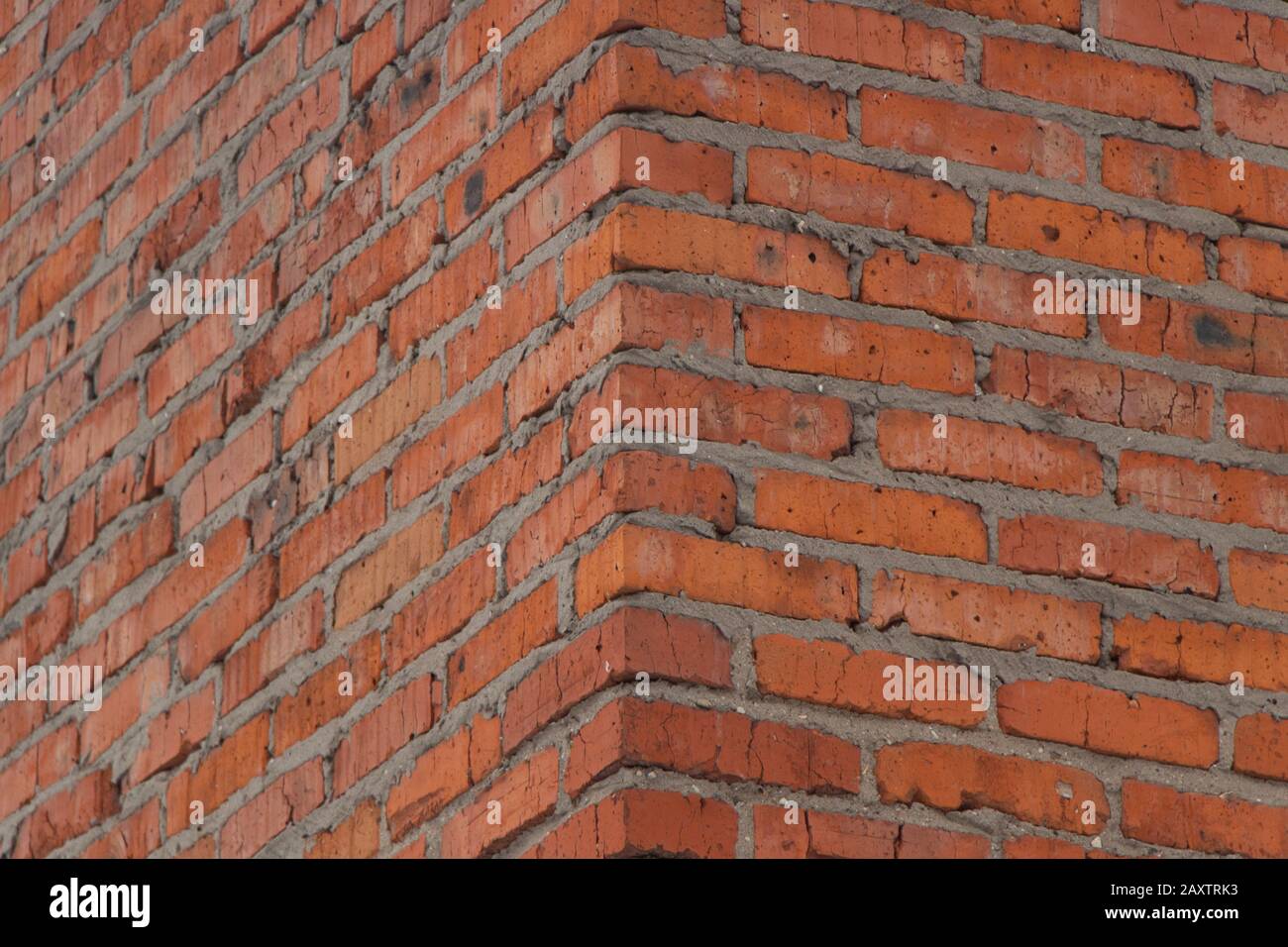 Brick wall texture. View of the brickwork from the corner of the ...