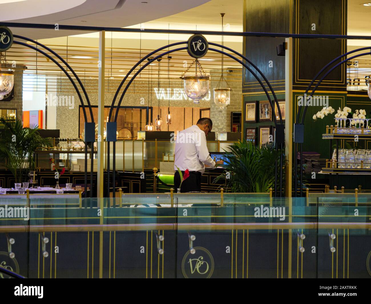 ION ORCHARD, SINGAPORE – 8 FEB 2020 - A waiter in the empty Violet Oon ...