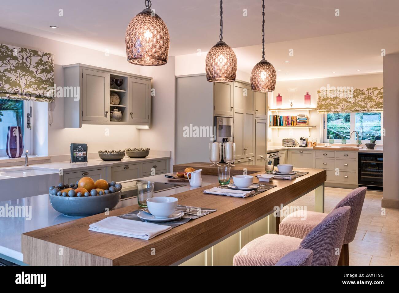 Place settings on kitchen counter Stock Photo - Alamy