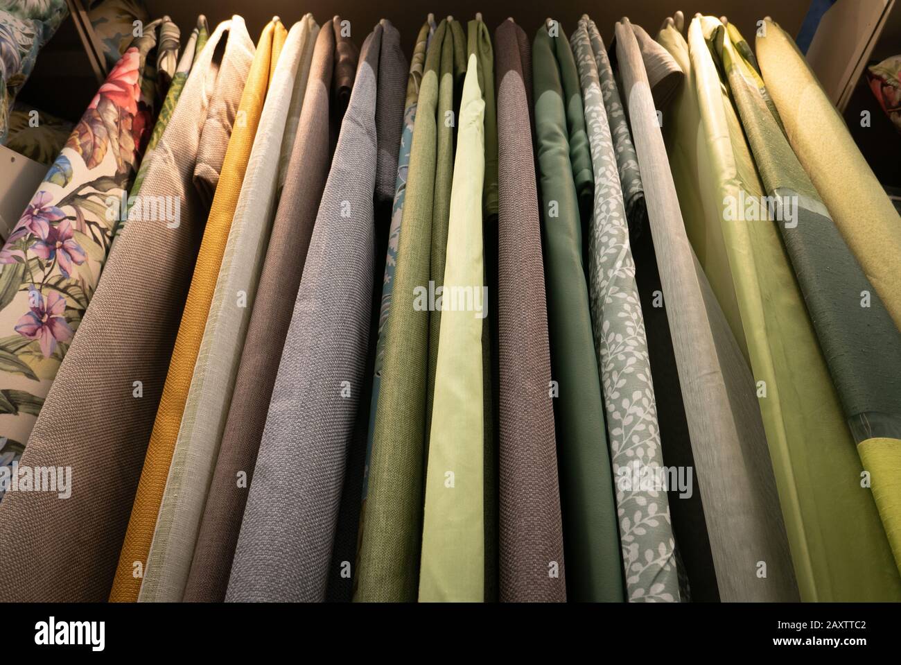 Fabric materials in a shop. Curtains at market Stock Photo - Alamy