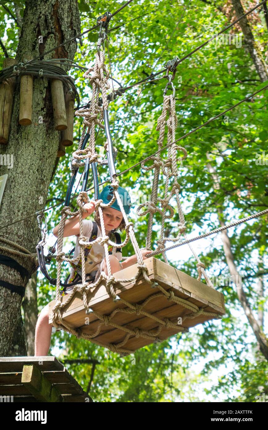 Young girl girls child kid on a children obstacle course activity Trail ...