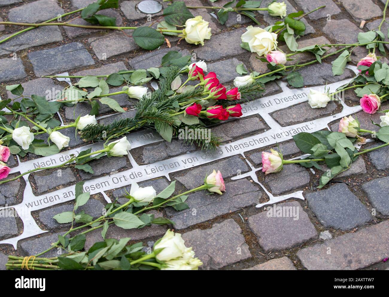 Dresden, Germany. 13th Feb, 2020. Flowers lie on the Altmarkt at a ...
