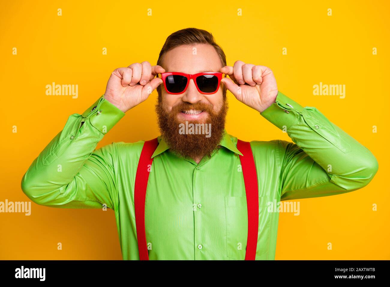Portrait of imposing satisfied friendly red bearded man enjoy spring ...