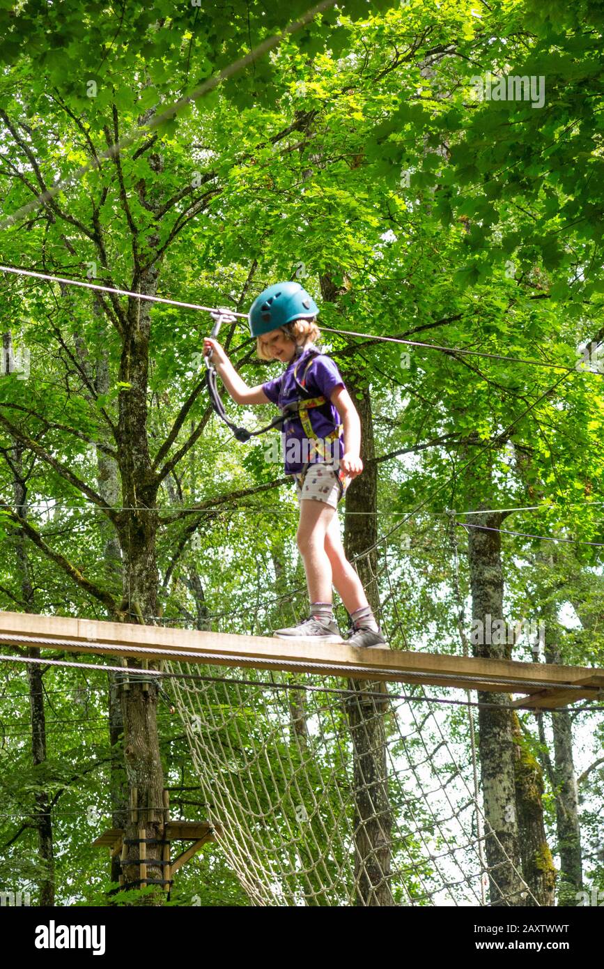 Young girl girls child kid on a children obstacle course activity Trail ...