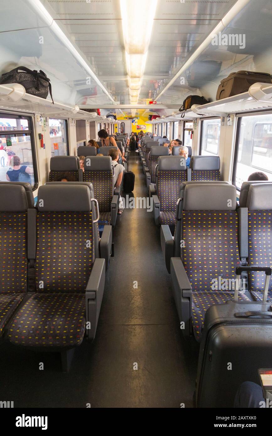 Interior of Swiss train carriage / SBB CFF FFS railway carriage interior showing seats / aisle ...
