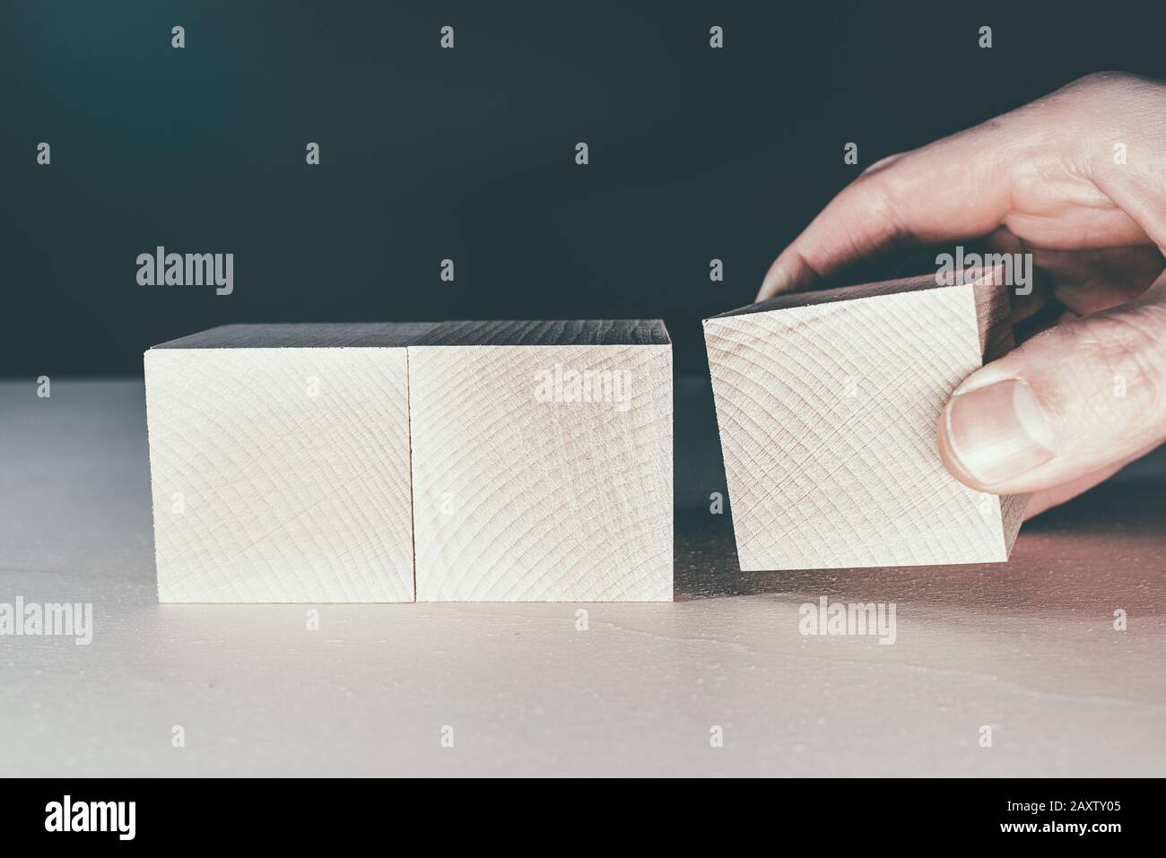 Three wooden blocks hi-res stock photography and images - Alamy