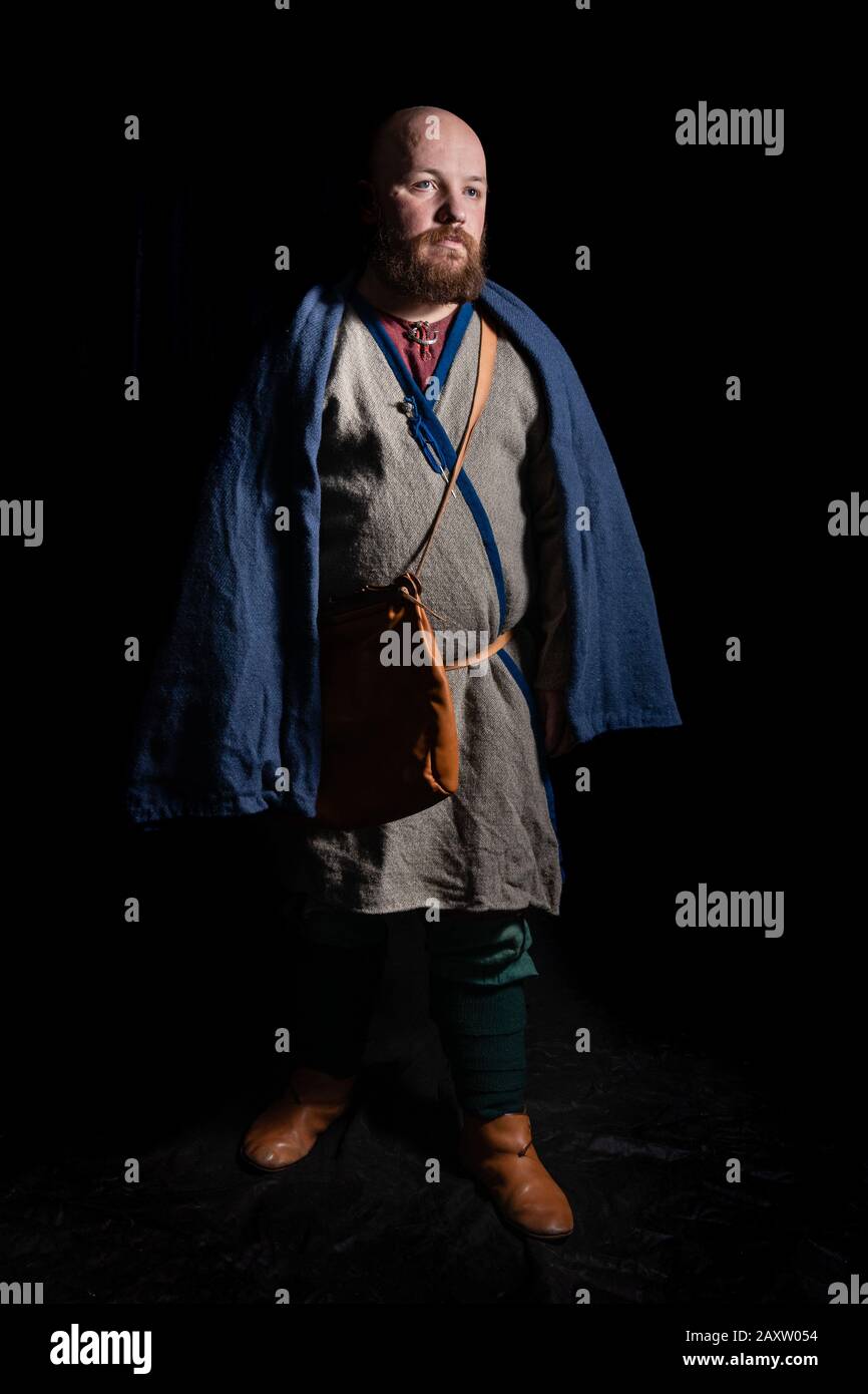 Overweight bearded man in the image of a medieval merchant Stock Photo ...