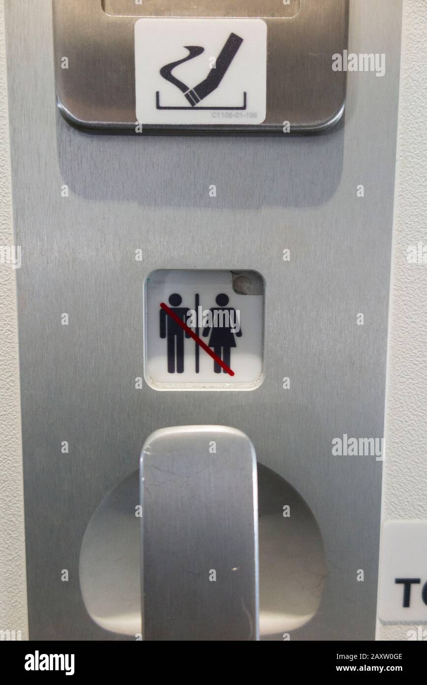 Handle on the inside of the toilet door with ash tray / ashtray and No ...