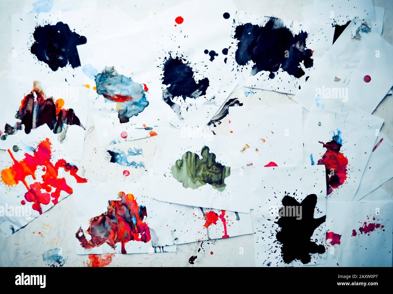 Many red colored blots on white paper with streaks. Abstract creative ...