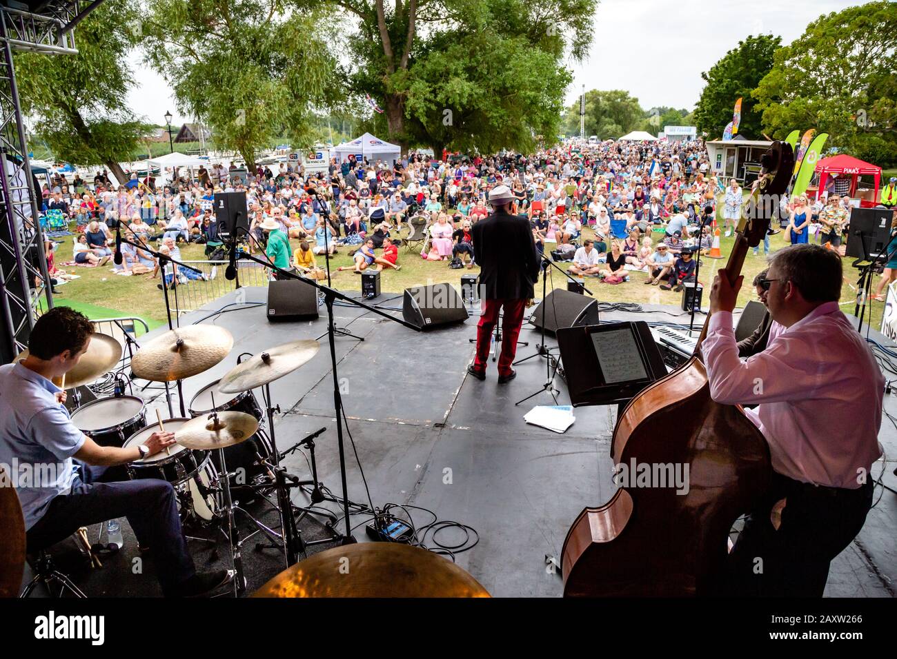 View from stage showing large festival crowd audience with drummer ...