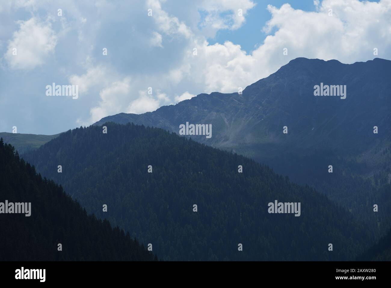 Various levels of mountains on the side of the valley Stock Photo - Alamy