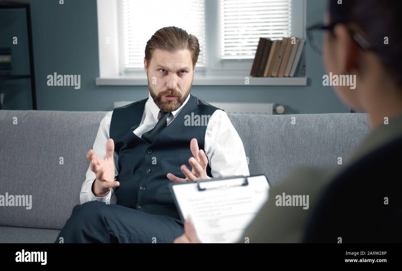 Patient speaking with psychologist Stock Photo - Alamy