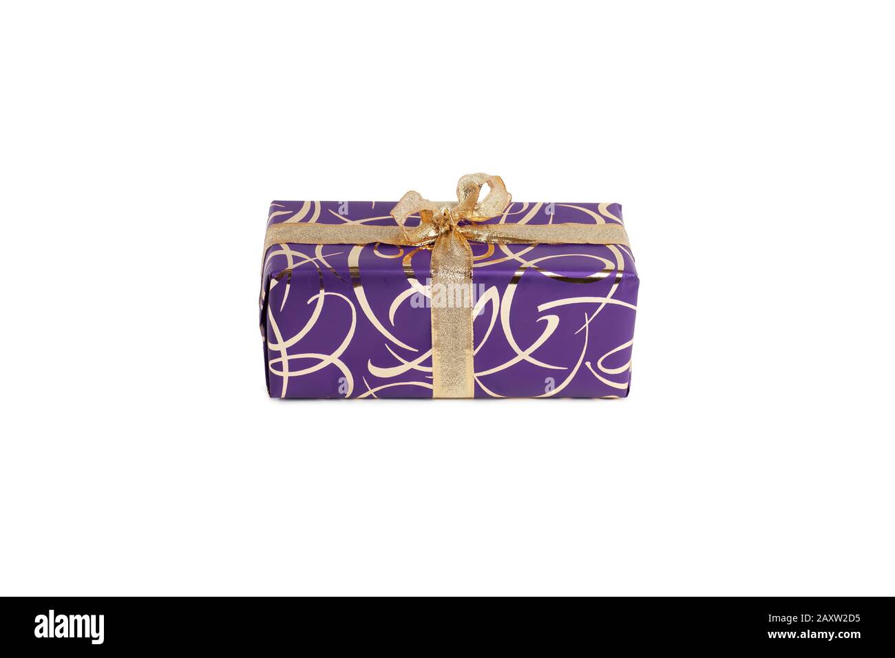 packaged rectangular gift in purple packaging with gold bow and gold ...