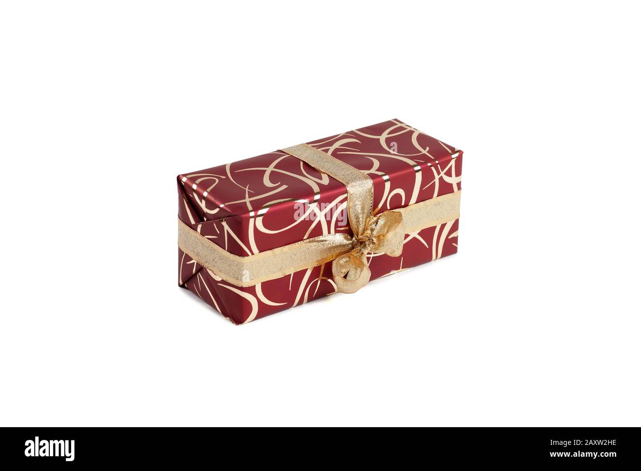 packaged rectangular gift in burgundy packaging with gold bow and gold ...