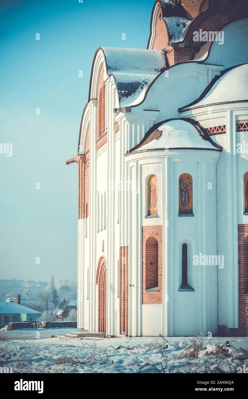 side part of the Christian church, brightly lit by the sun in winter ...