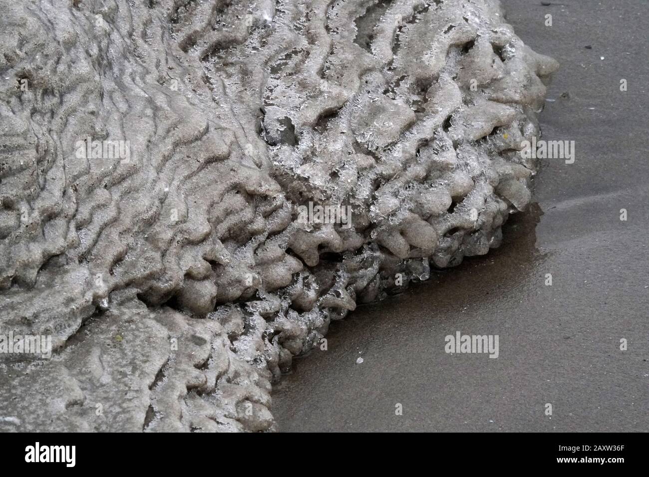 Ice sand and water formations at lake Stock Photo - Alamy