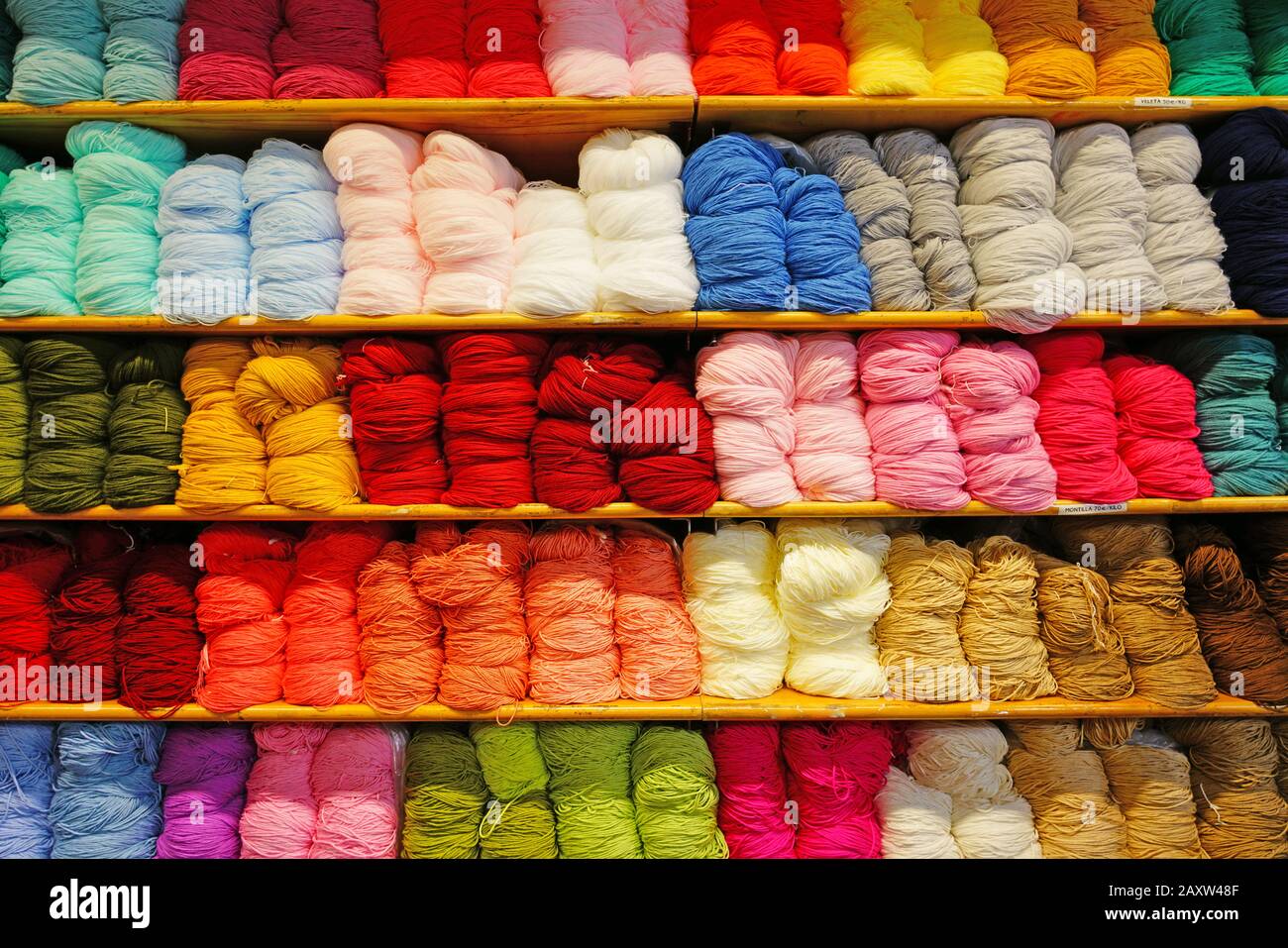 Shelves filled with colorful wool yarn spools in a knitting store Stock ...