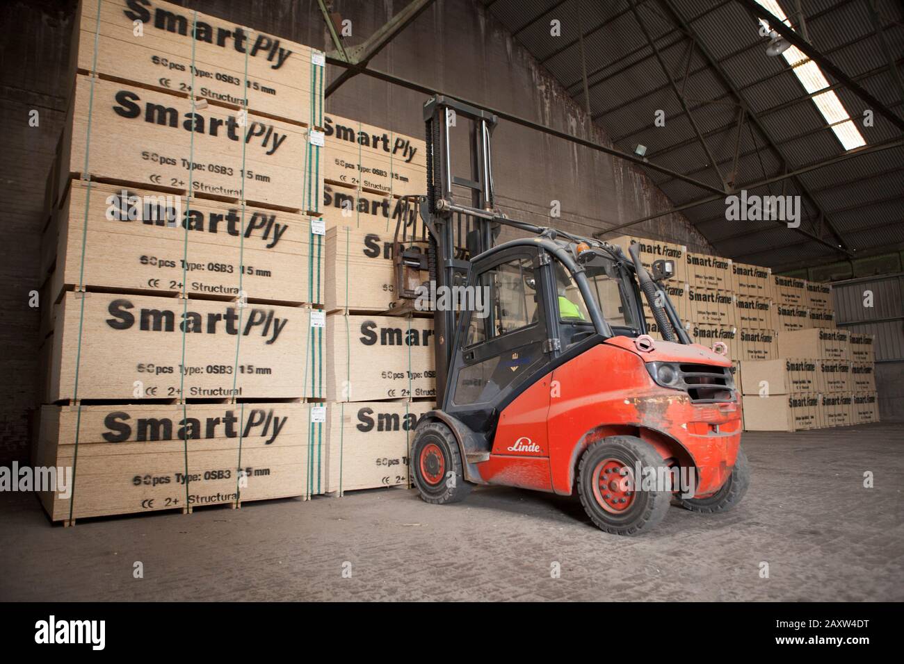 Forklift truck moving Smart Ply sheets Stock Photo - Alamy